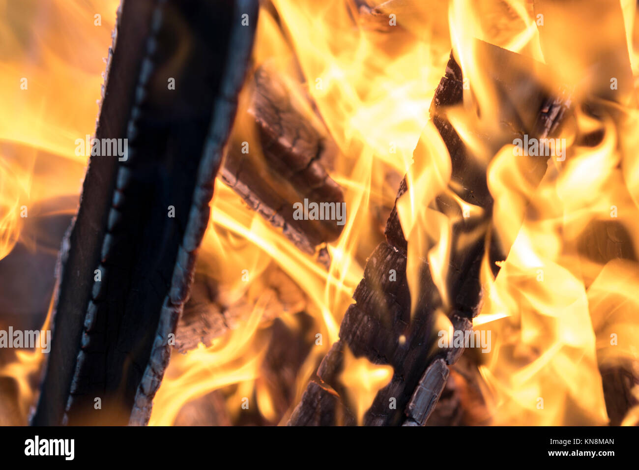 Fire and Frame with firewood Stock Photo - Alamy