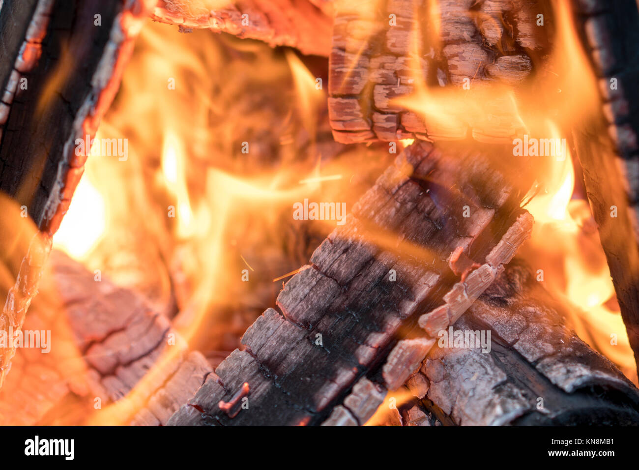 Bright flame on dark background. Bright heat after fire. Bonfire in the ...