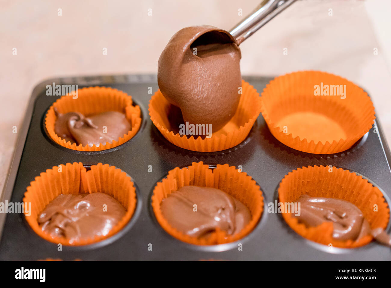 The process of preparing cupcakes in the kitchen, ingredients closeup ...