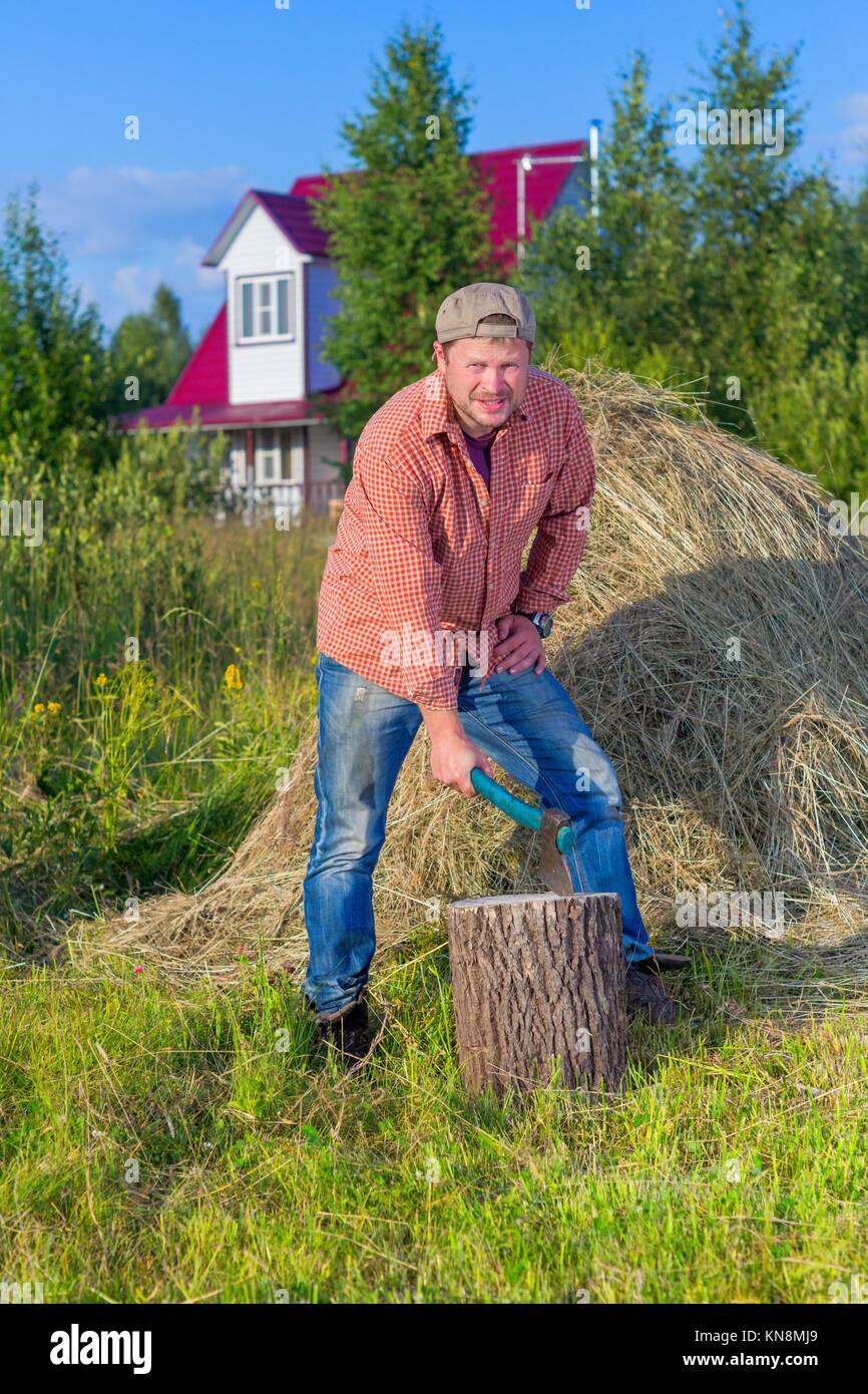 Farmer with axe hi-res stock photography and images - Alamy