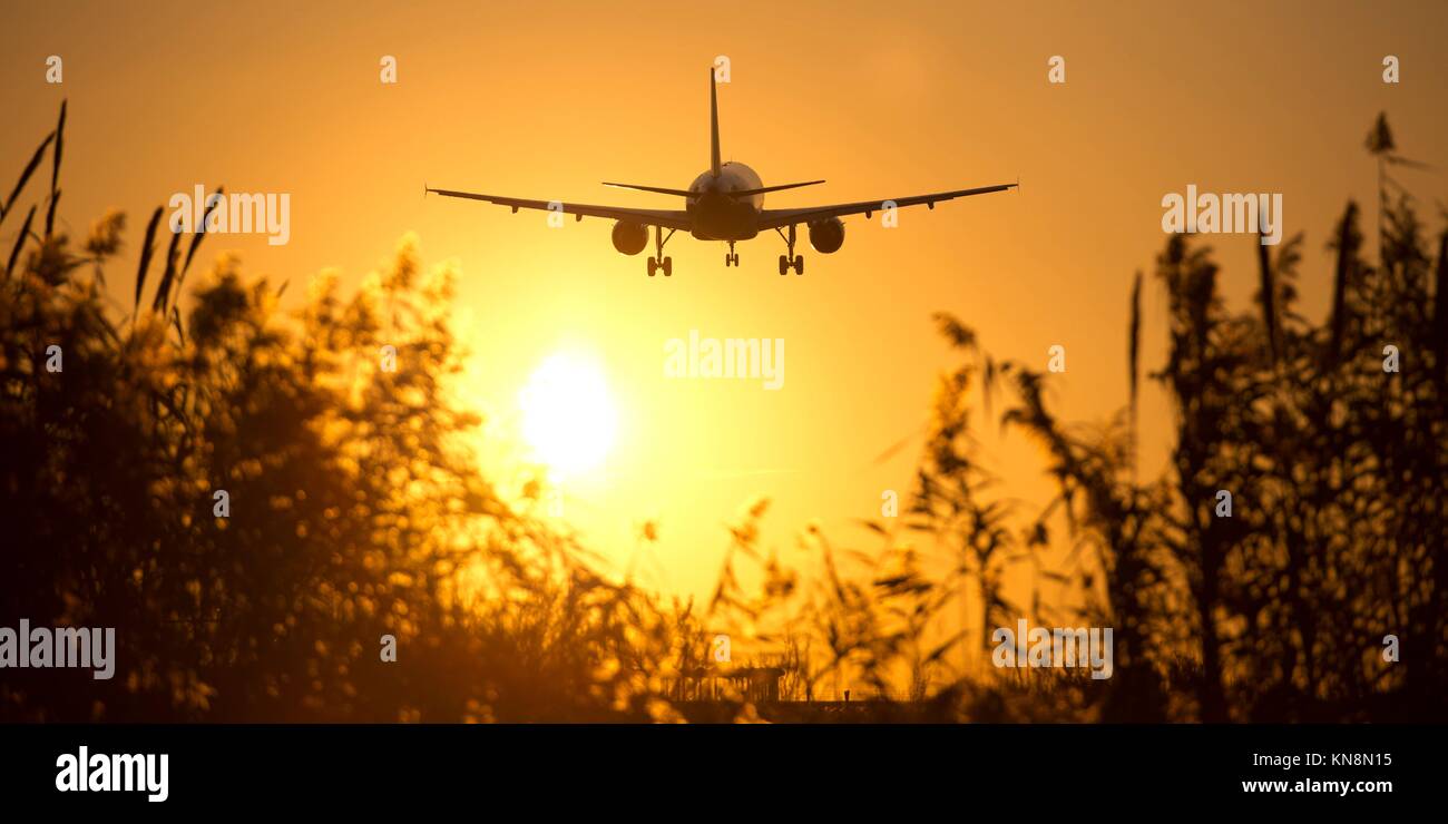 Image Plane In Sunset Sky High Resolution Stock Photography and Images ...