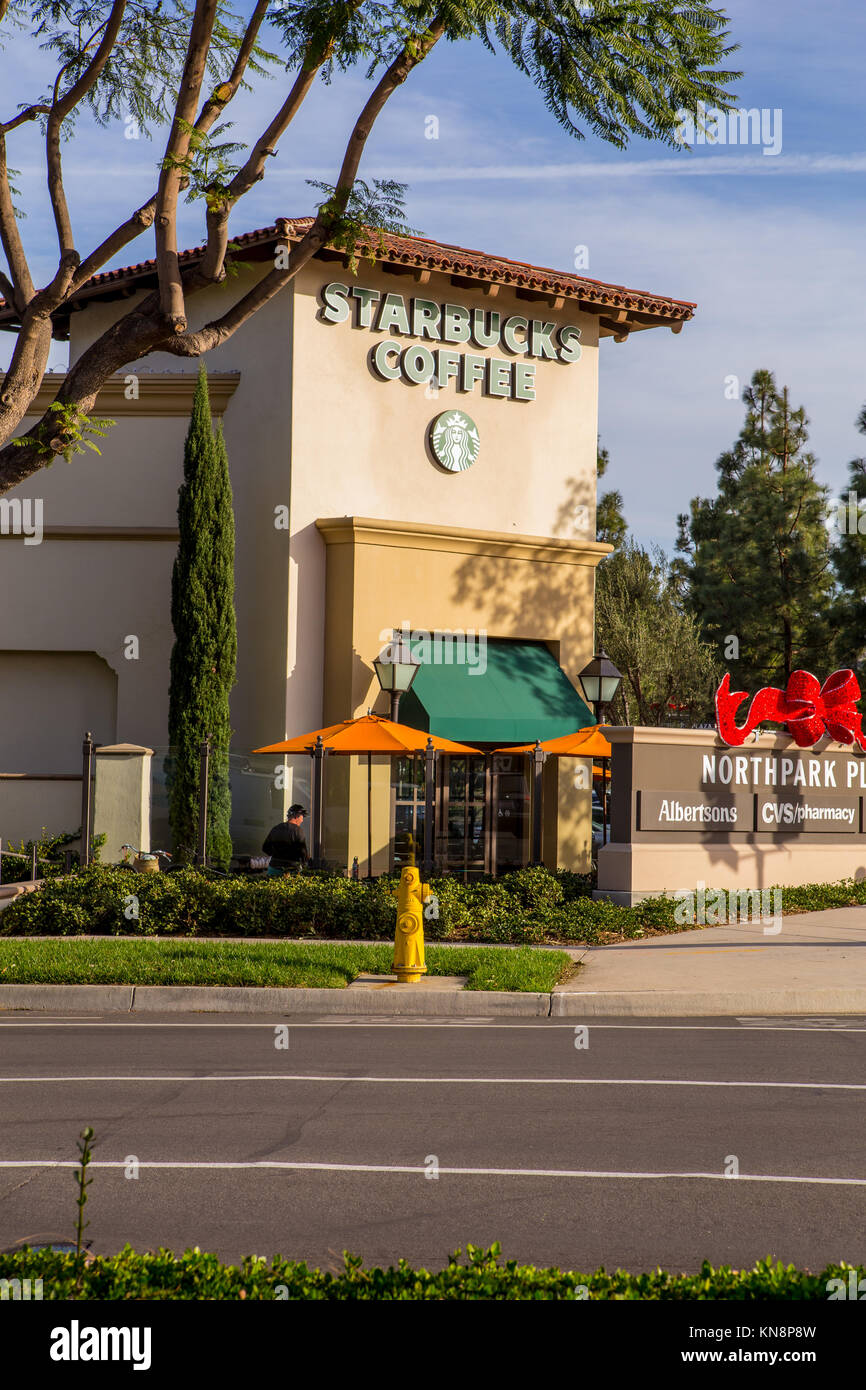 A street level view of the exterior of a Starbucks cofee shop in Irvine ...
