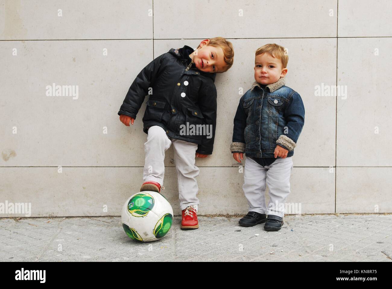Two boys playing town hi-res stock photography and images - Alamy