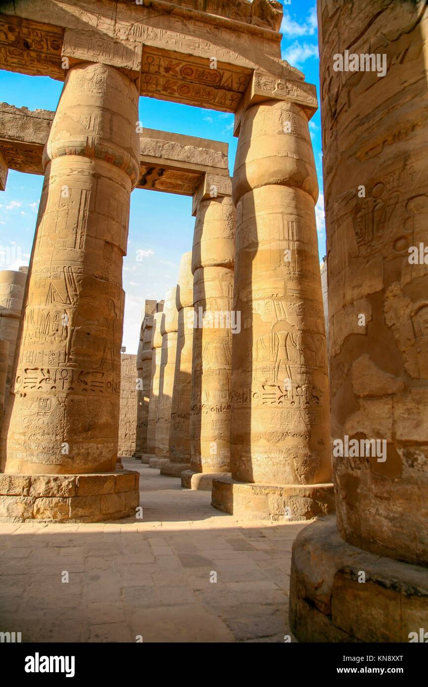 big stone columns with carving figures and hieroglyphs in landmark ...
