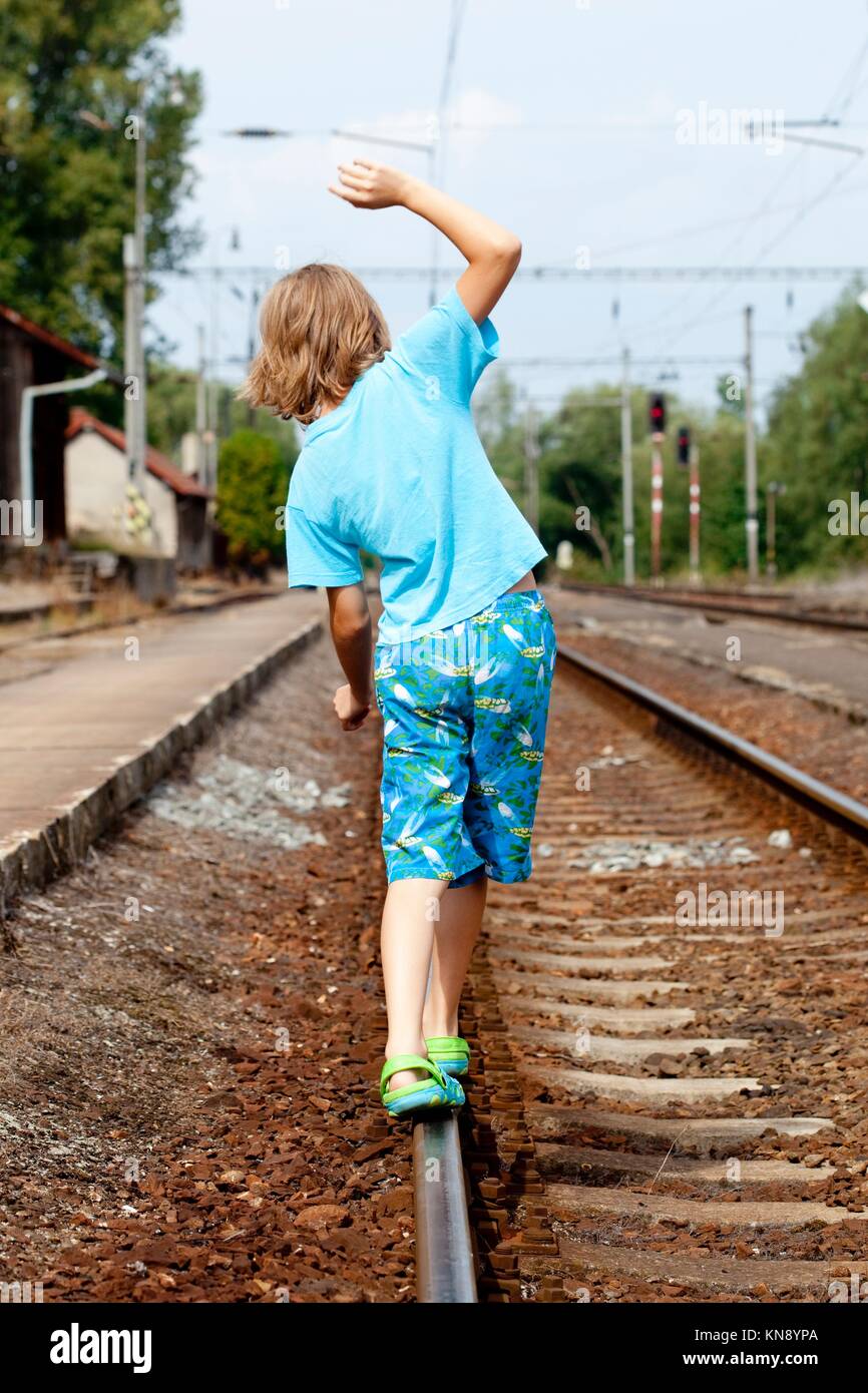 Child walking on railway hi-res stock photography and images - Alamy