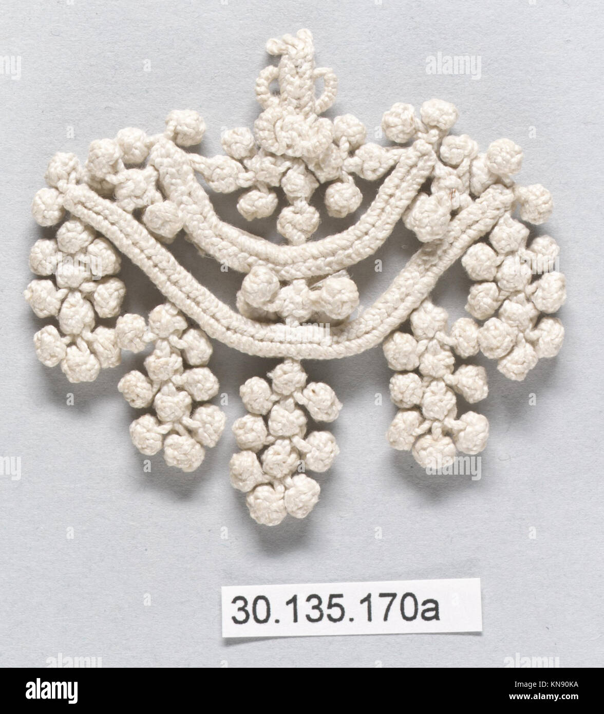 This textile fringe, likely from a 19th-century garment, is an example ...