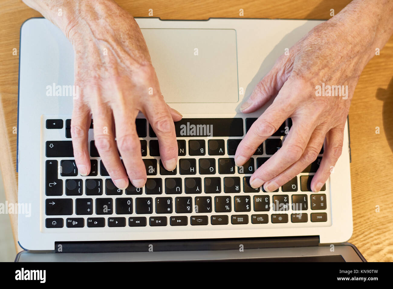 Mature lady typing hi-res stock photography and images - Alamy