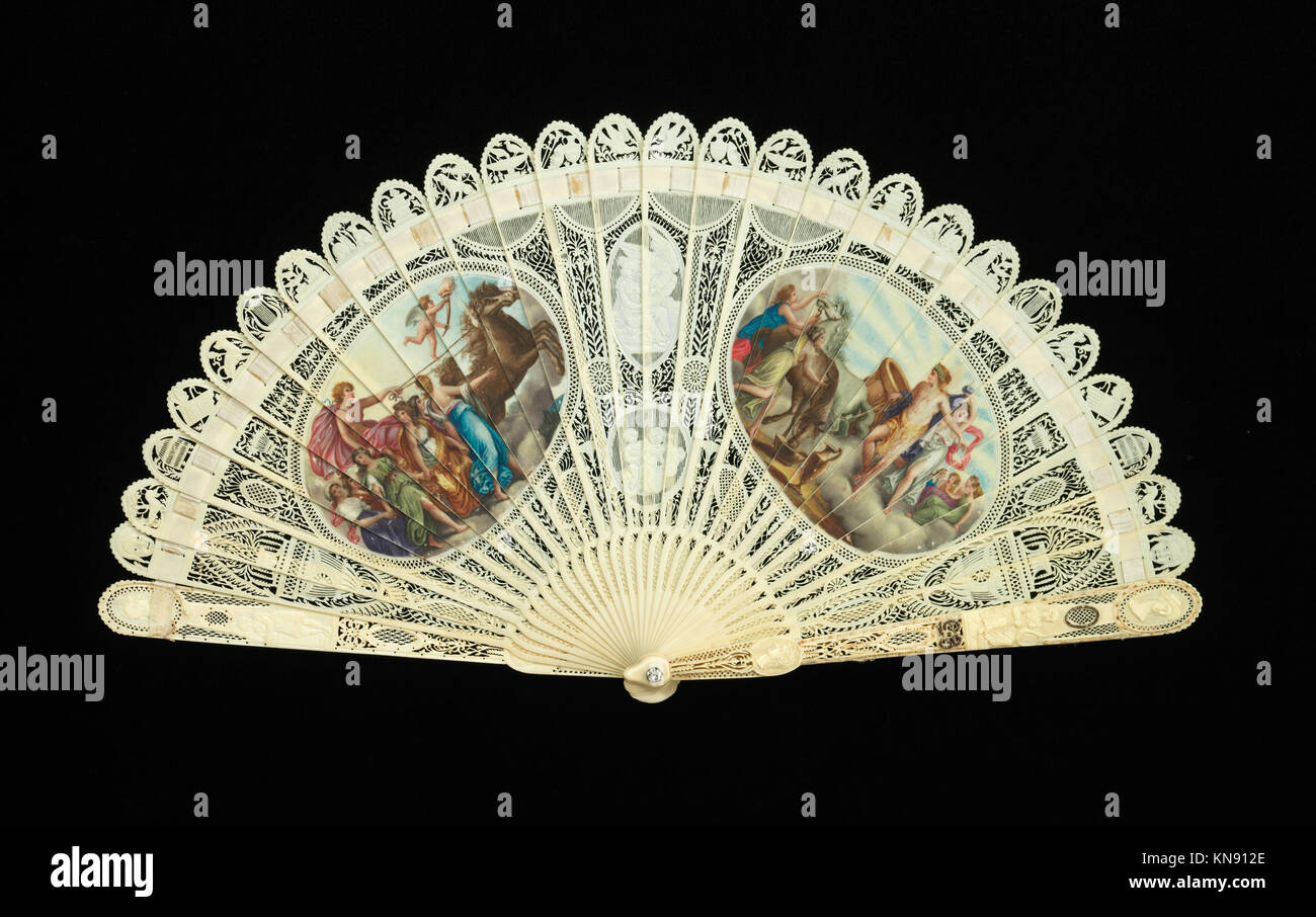 This fan, known as a 'Bris' fan, is a decorative item showcasing ...