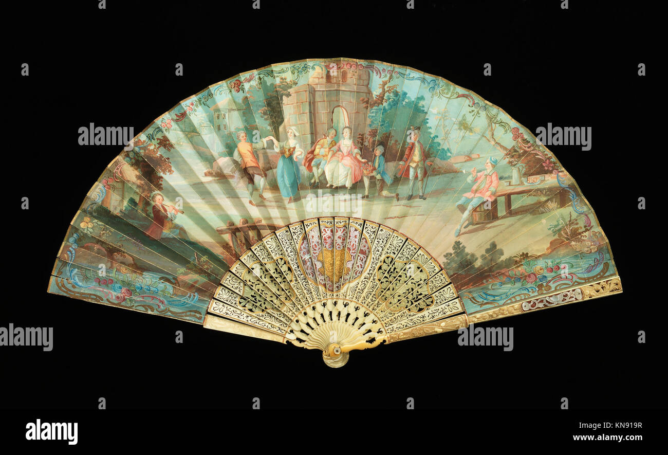 This decorative fan features intricate designs, typical of 18th-19th ...