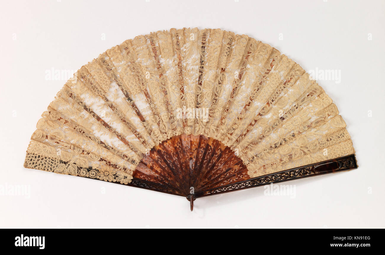 This fan features intricate design and craftsmanship, demonstrating the ...