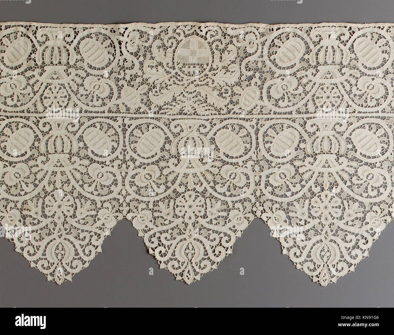 A decorative flounce, showcasing detailed textile work and fine ...