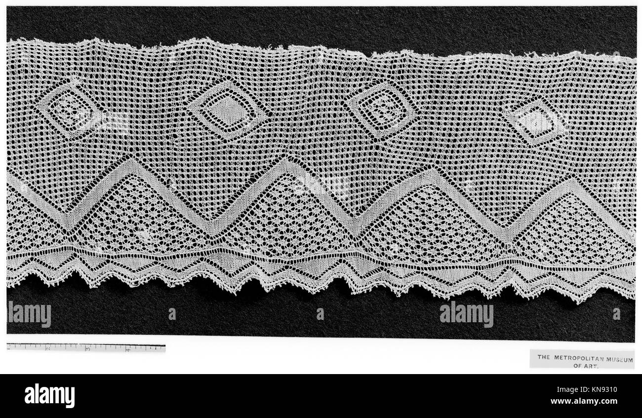 This edging, likely from a larger textile or garment, reflects ...