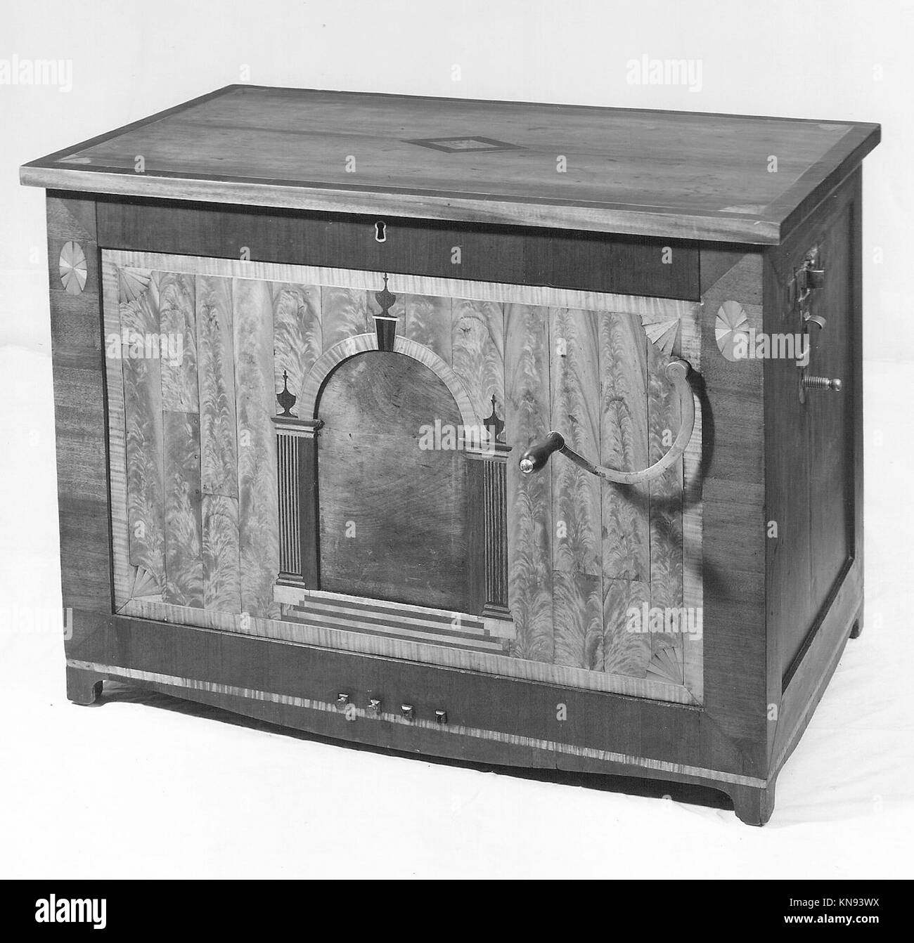This barrel organ is an early mechanical musical instrument producing ...