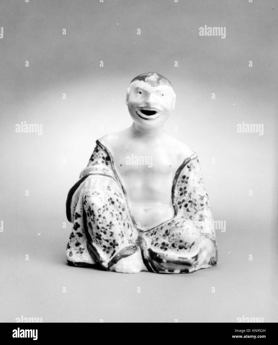 This sculpture depicts a Buddhist divinity, showcasing traditional ...