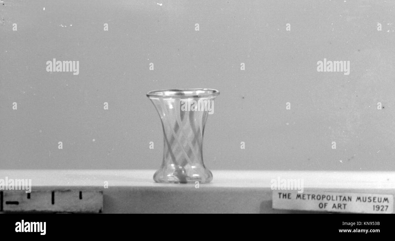 This beaker is a simple yet functional object, likely used for drinking ...