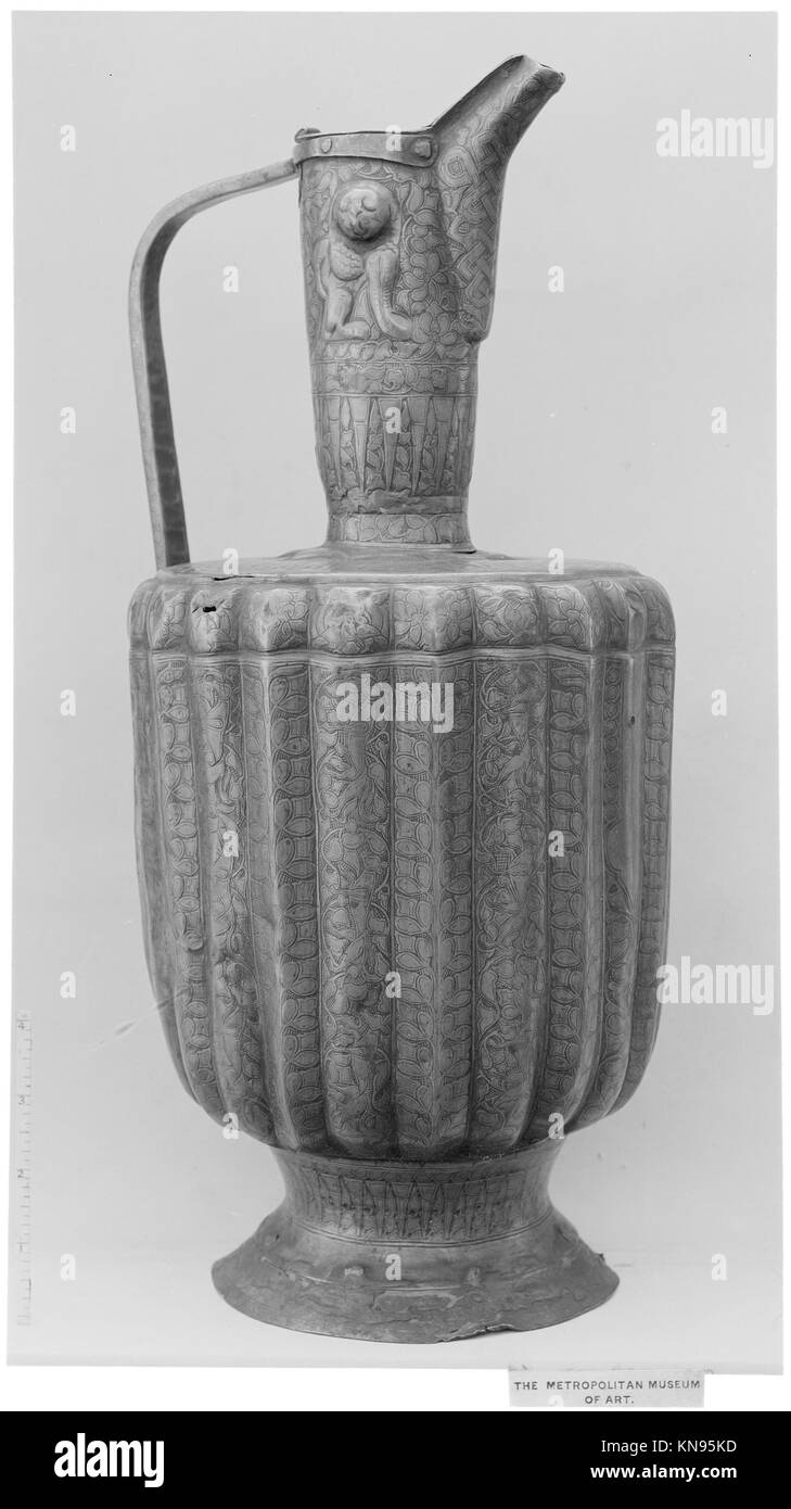 This ewer, a type of pitcher, is crafted from fine materials ...