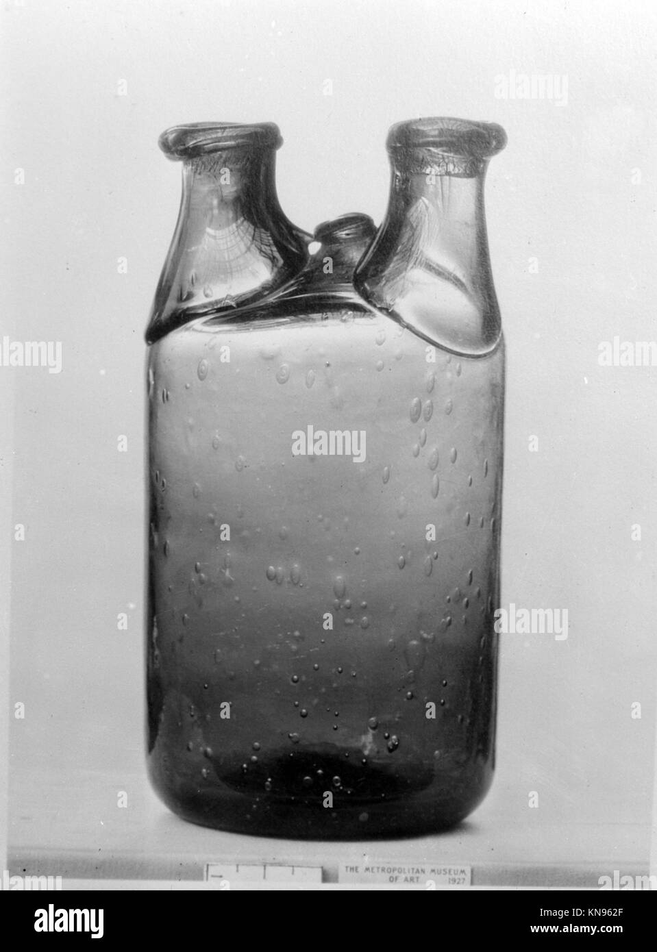 This bottle is an artifact representing an example of ancient or period ...