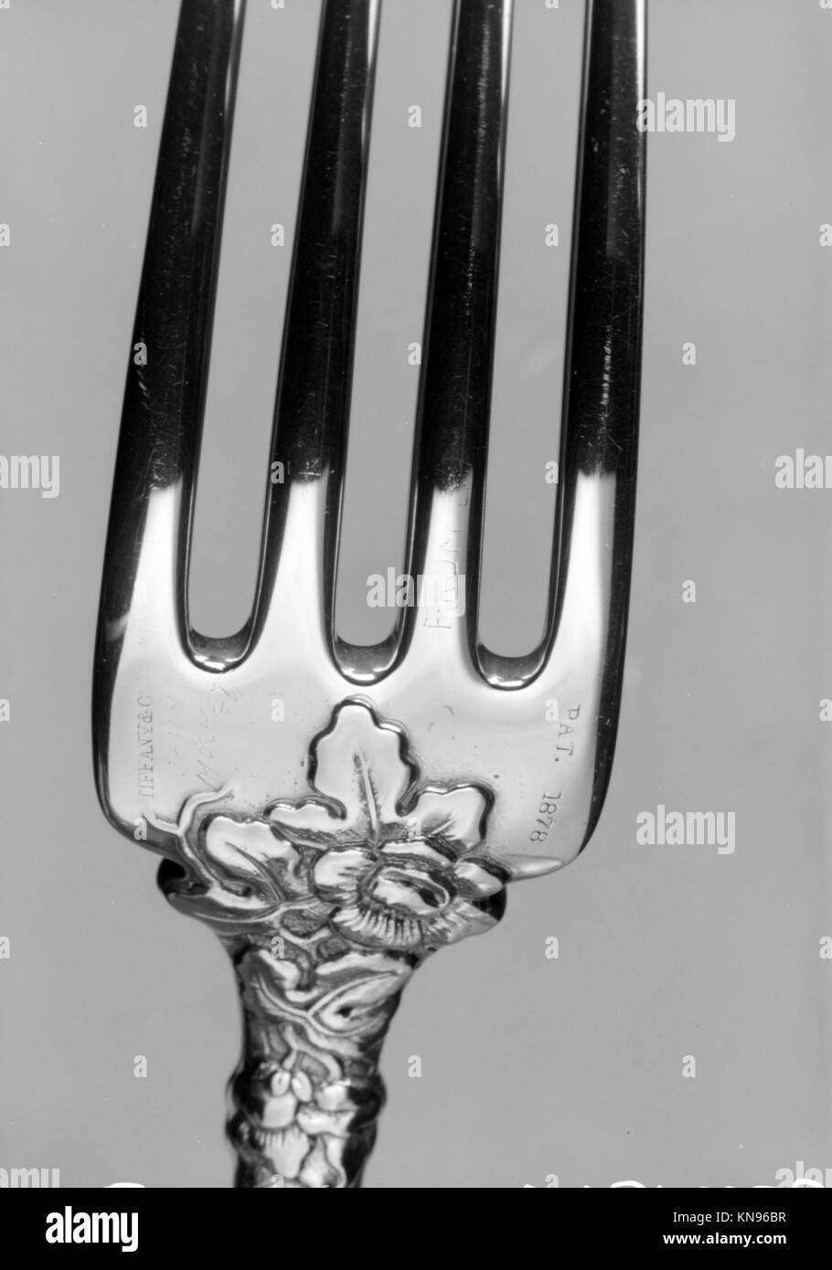 A metal fork from the 18th century, reflecting European tableware ...