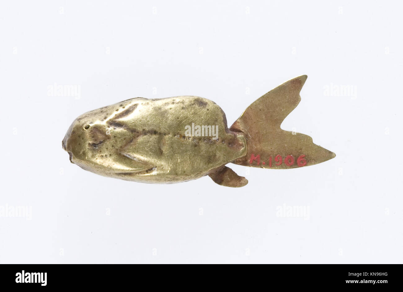 This fish-shaped amulet illustrates ancient craftsmanship, symbolic ...