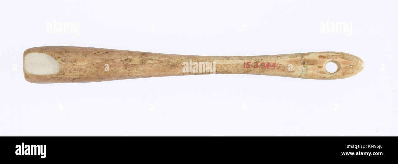 This fish net needle, used for creating nets, reflects the practical ...