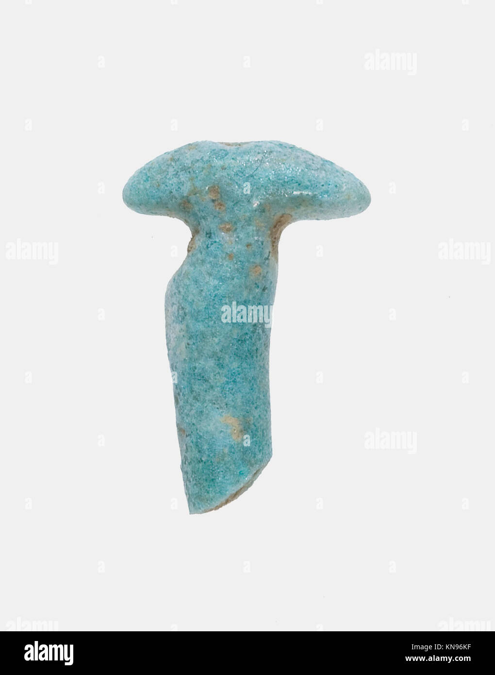 This amulet, crafted from precious material, likely served as a ...