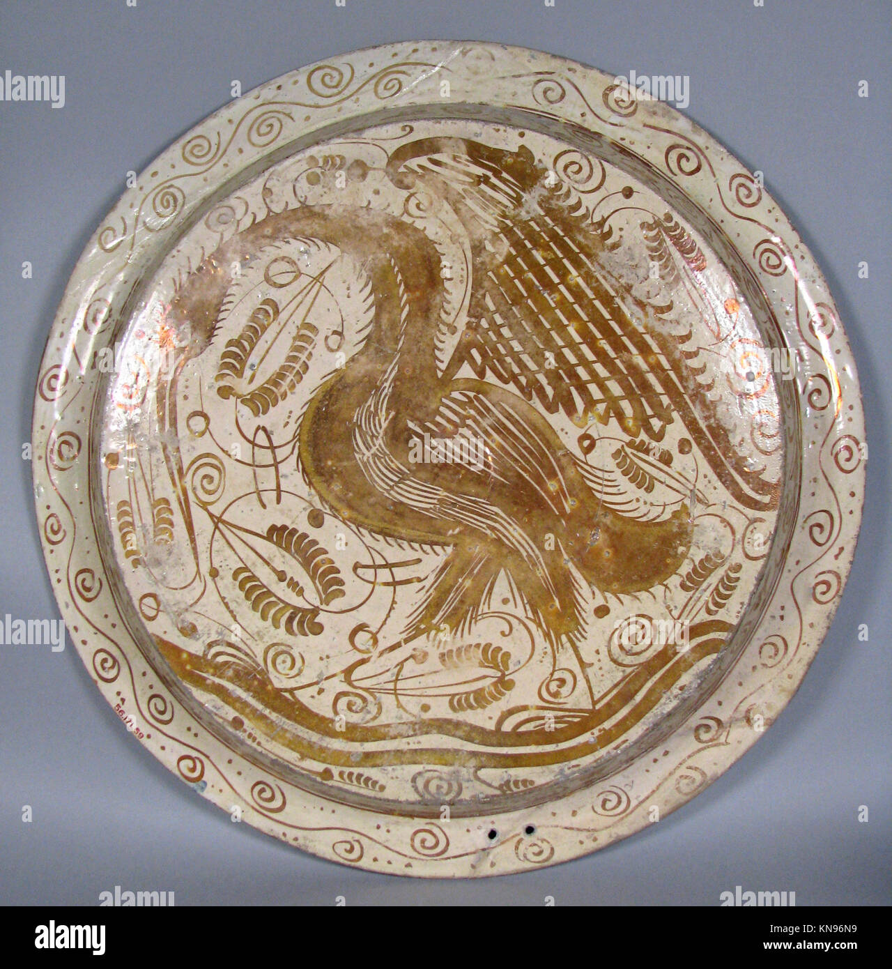 This deep dish, crafted with precision, exemplifies the art of pottery ...