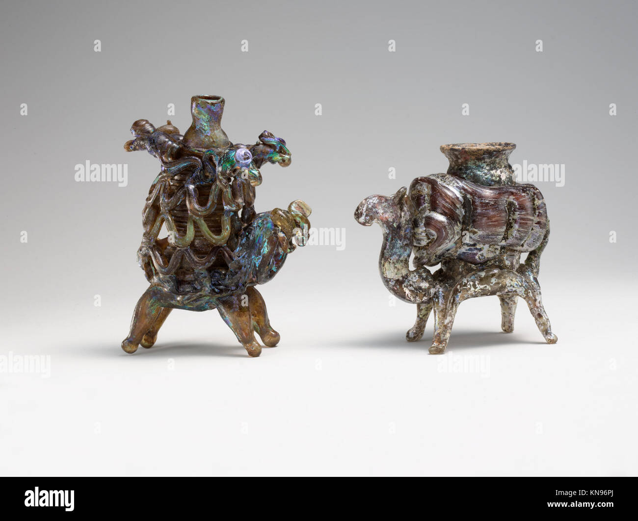 This animal flask, crafted from ceramic, features a detailed animal ...