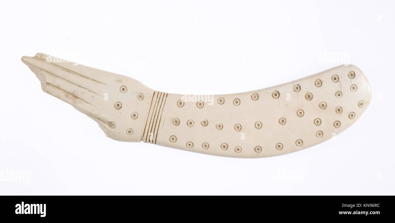 This clapper, a percussion instrument, was used in religious or ...