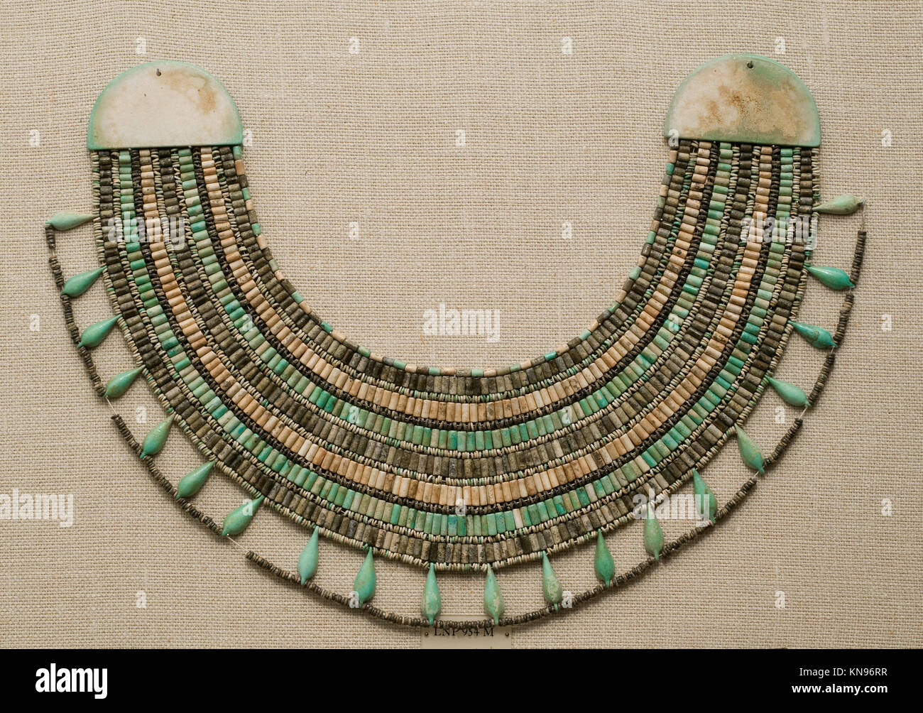 An ancient Egyptian broad collar displaying intricate beadwork ...