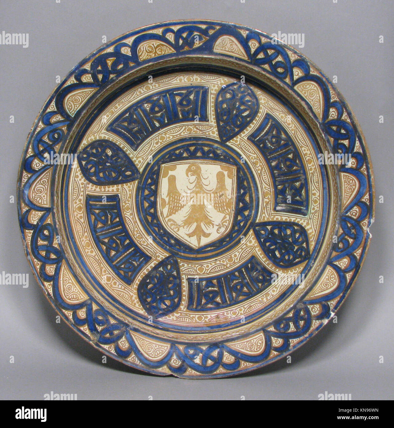 This deep dish, featuring a traditional design, serves as both a ...