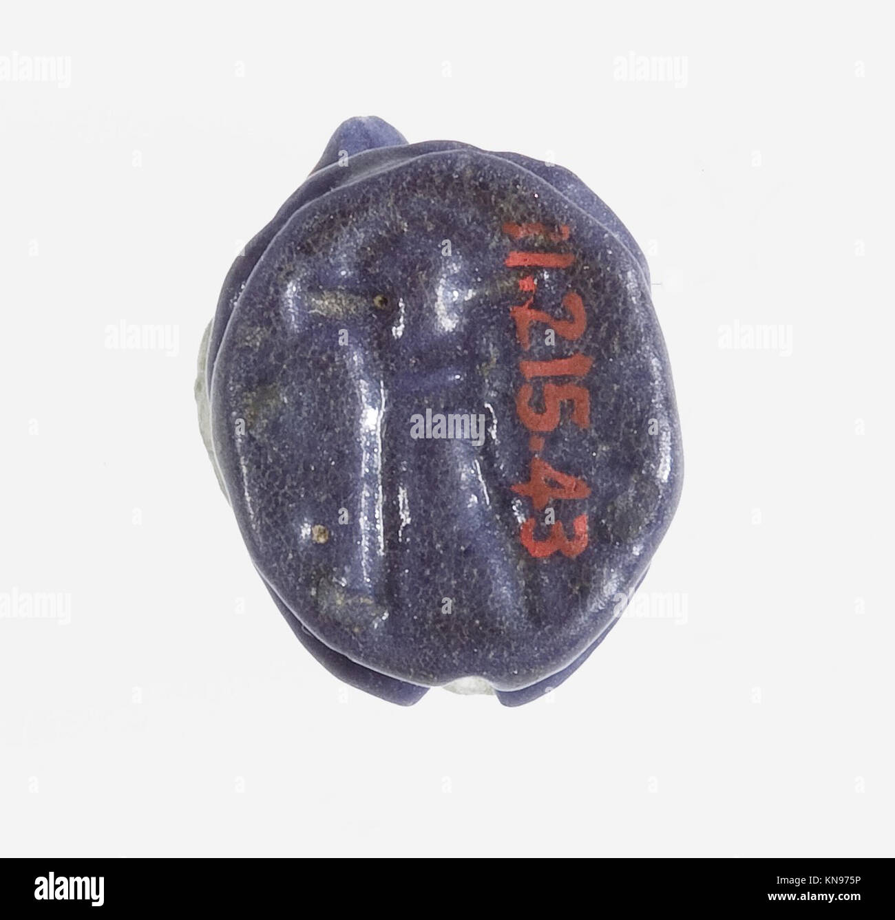 This frog-shaped amulet features a Sa hieroglyph on its base ...
