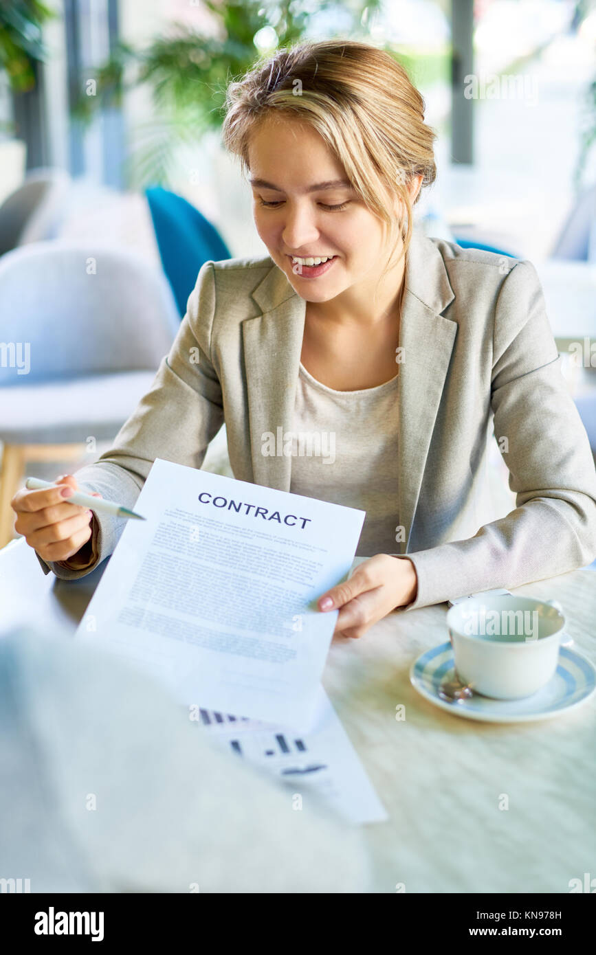 Young Business Woman Presenting Contract Stock Photo - Alamy