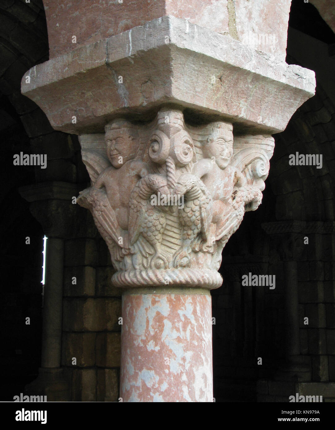 This capital, part of an architectural column, displays the decorative ...