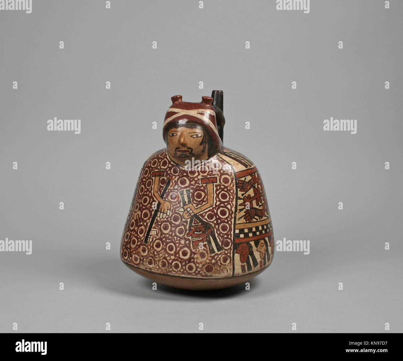 This is a figure bottle from the 18th century, made of porcelain, with ...