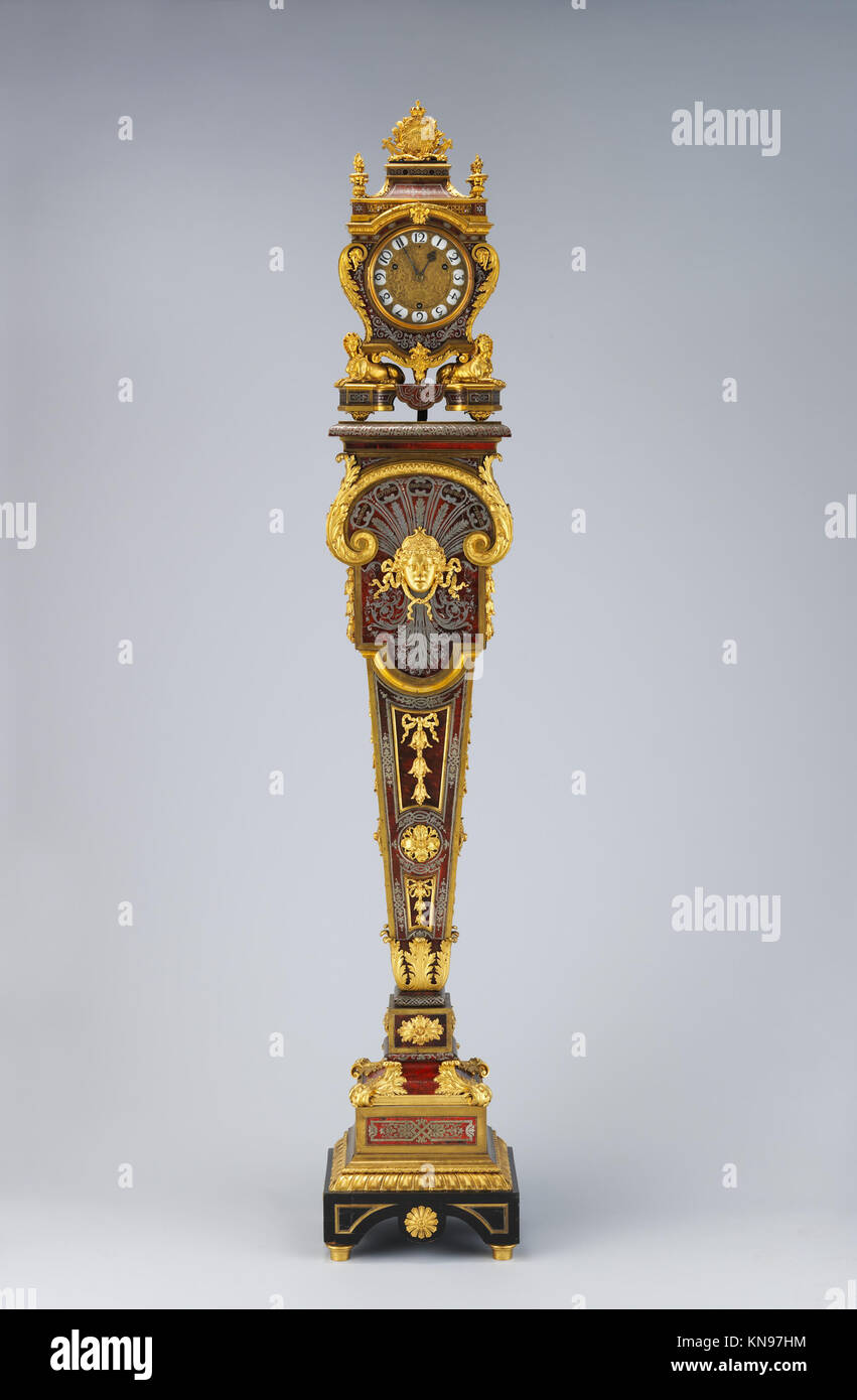 A clock mounted on a pedestal, designed to be both functional and ...