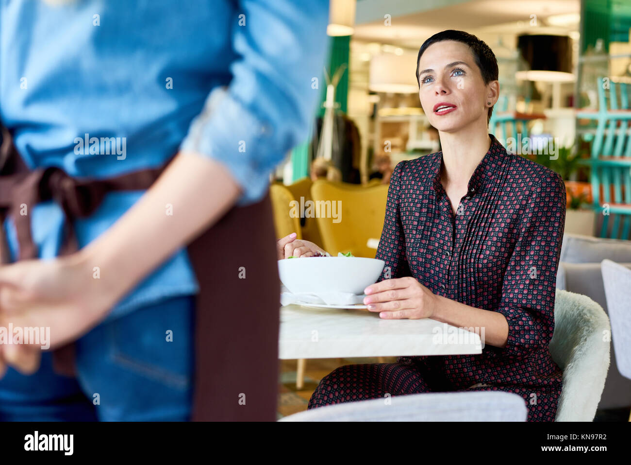Woman Complaining in Cafe Stock Photo - Alamy