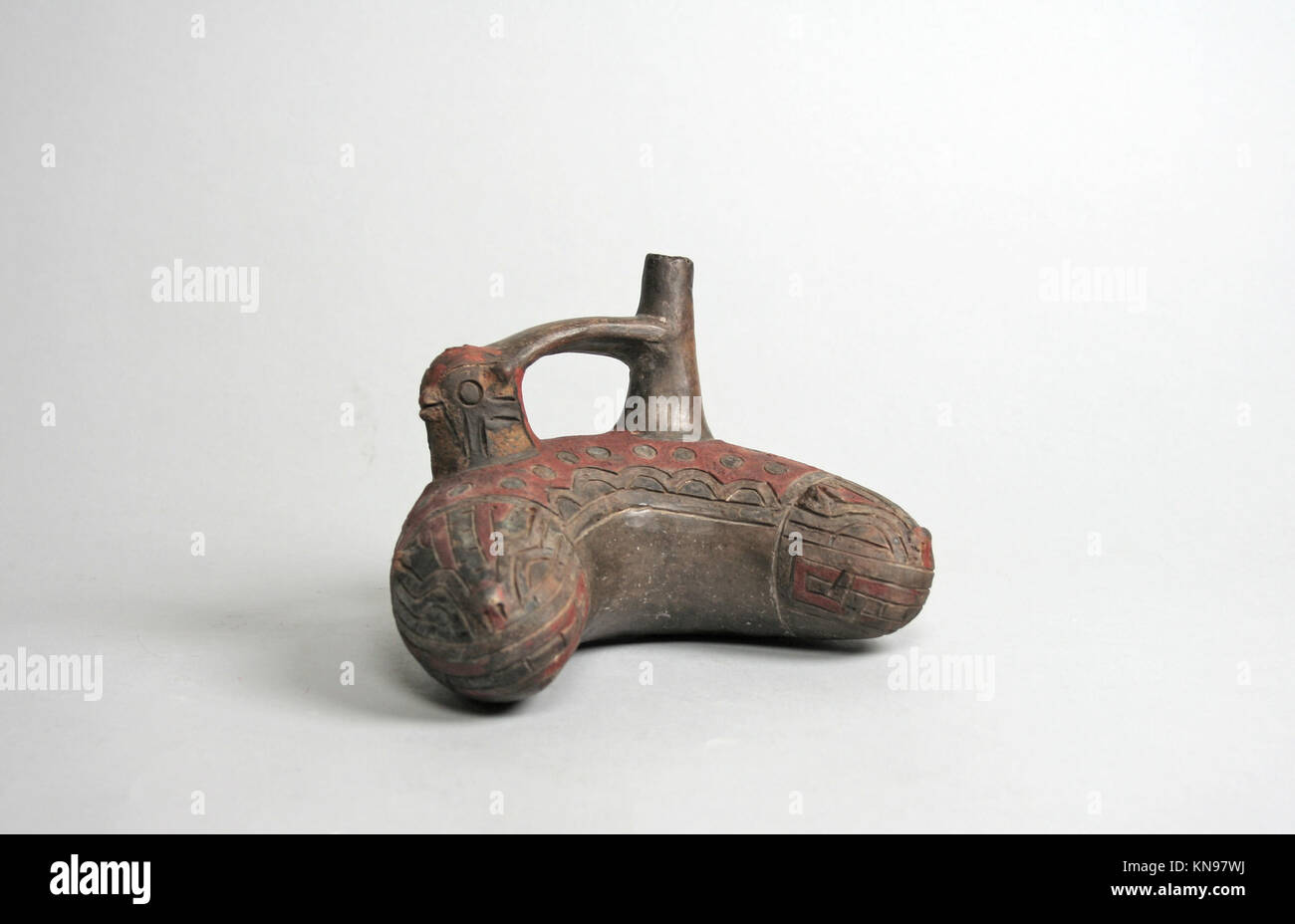 This double-end snake bottle features two intertwined serpents ...