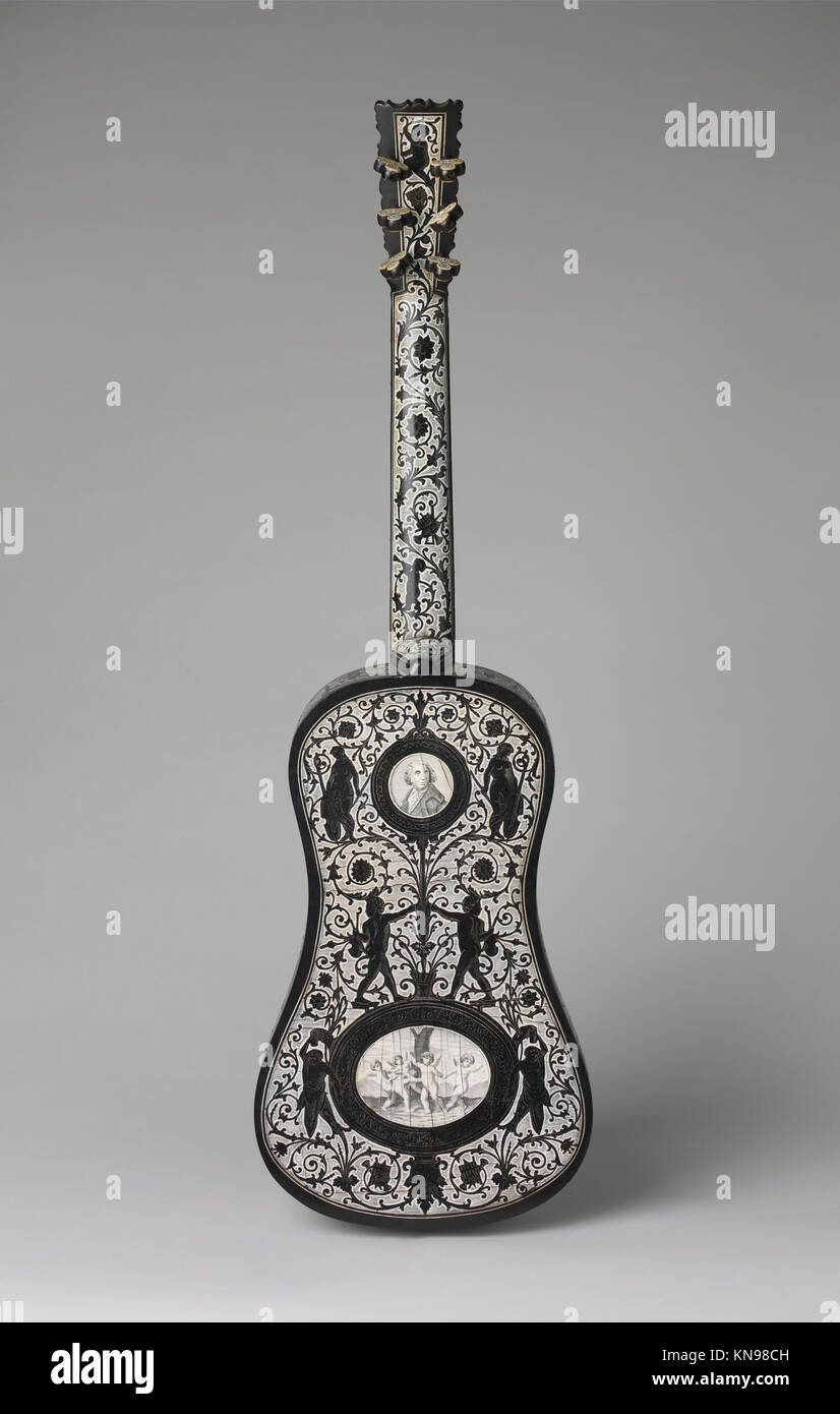This guitar, part of the MET collection, represents the craftsmanship ...