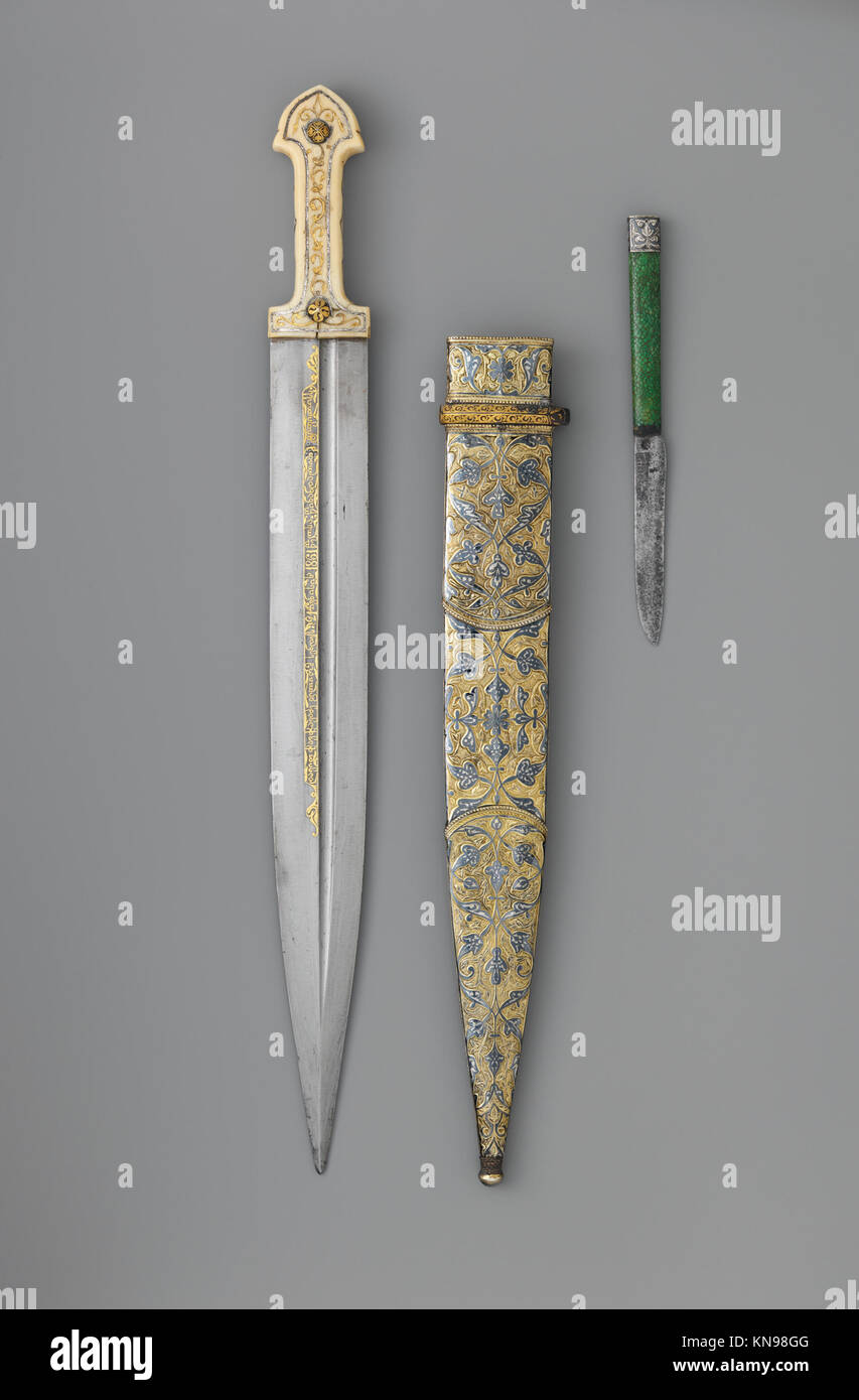 This Qama dagger, along with its sheath and knife, is a historical ...