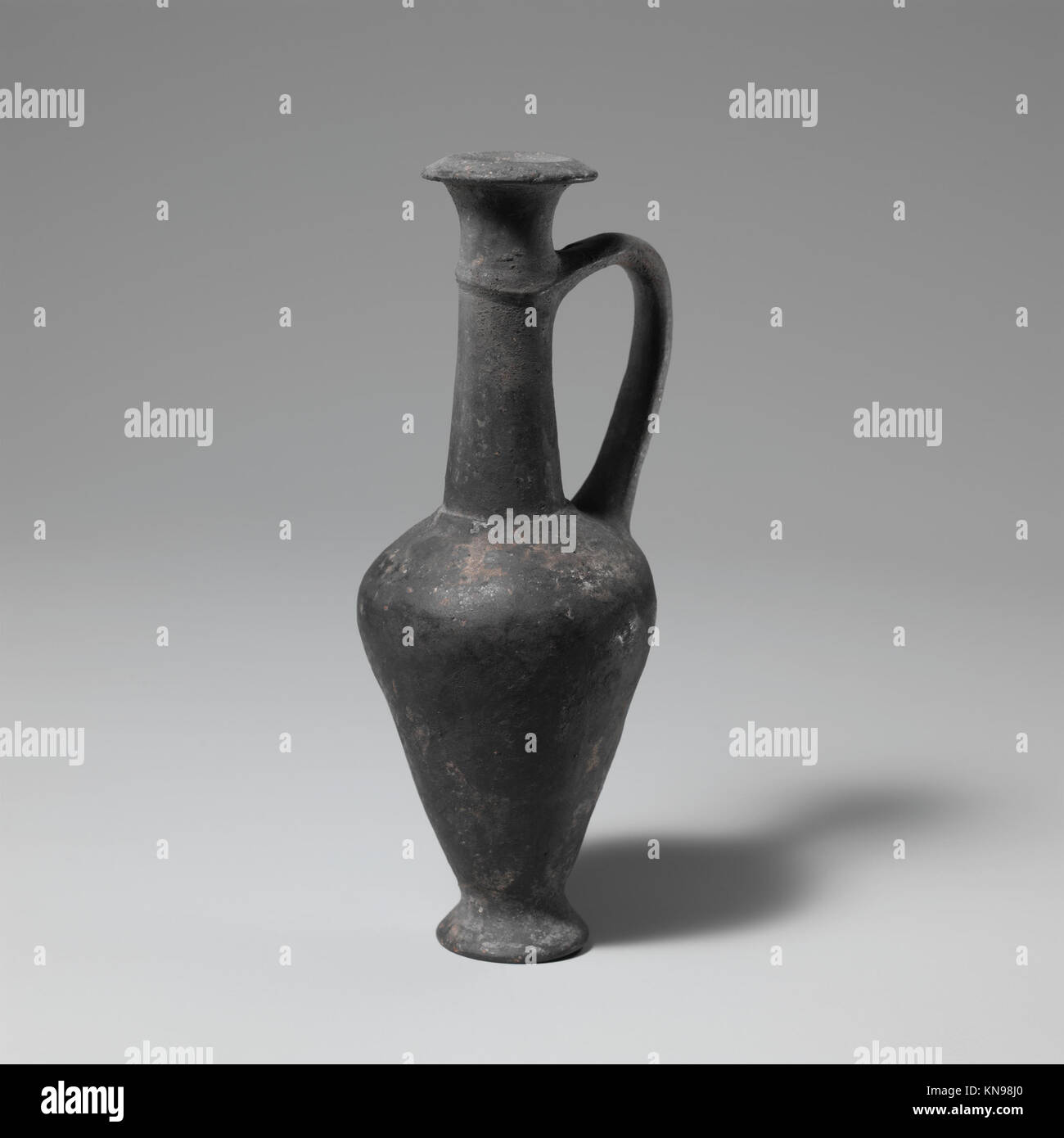 This Cypriote juglet, featuring a ring-based design, exemplifies the ...