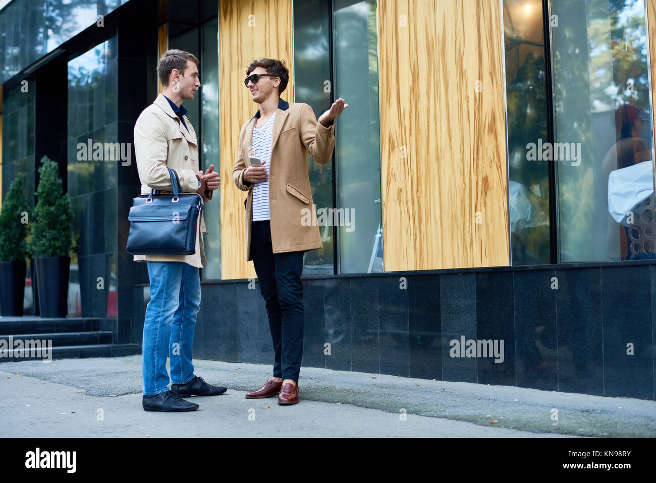 Stylish man chatting using hi-res stock photography and images - Alamy