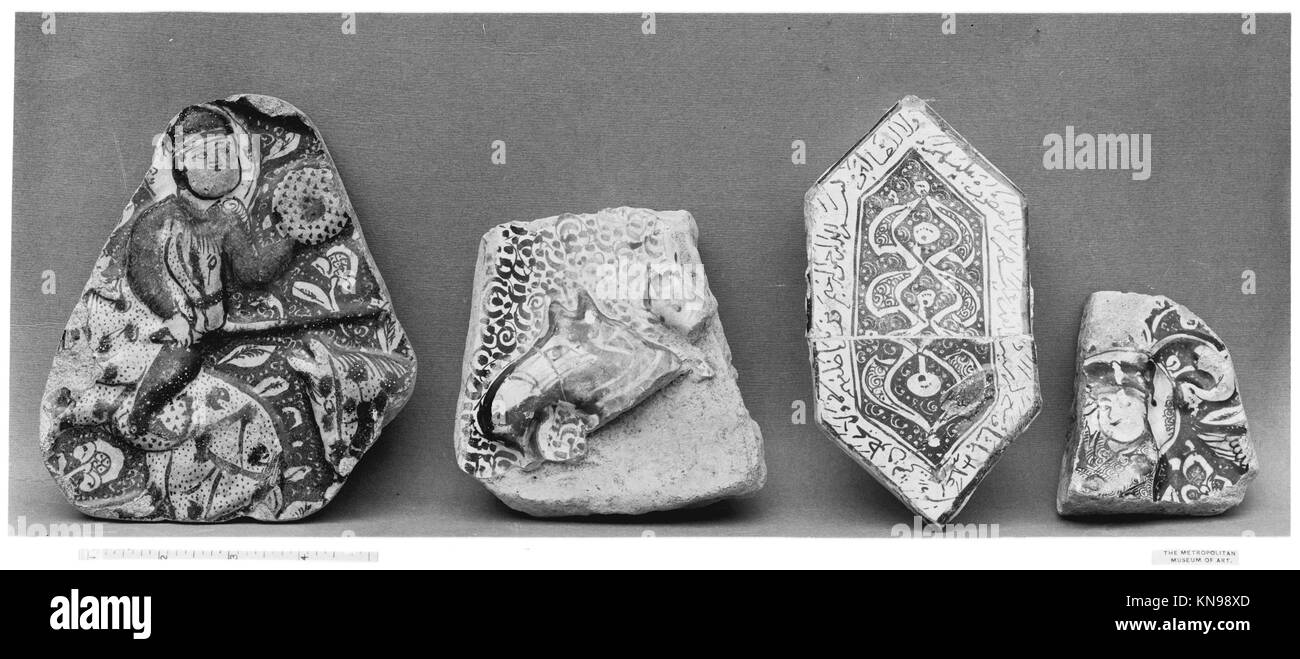 This cross-shaped tile fragment features intricate design and ...