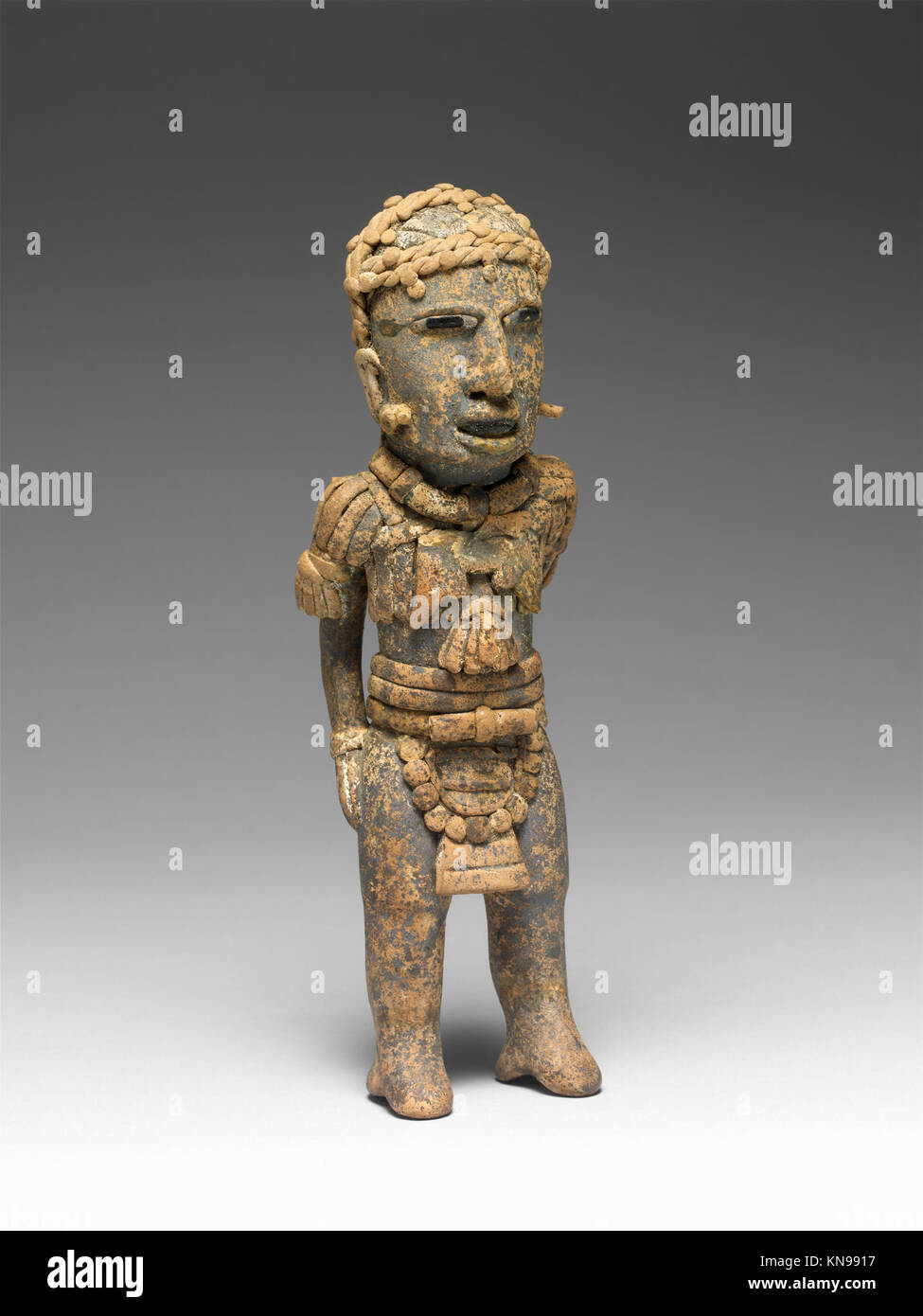 This figure represents a well-crafted example of period sculpture ...