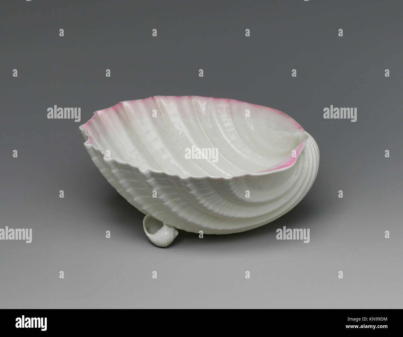 This footed dish, part of the MET collection, features a detailed ...