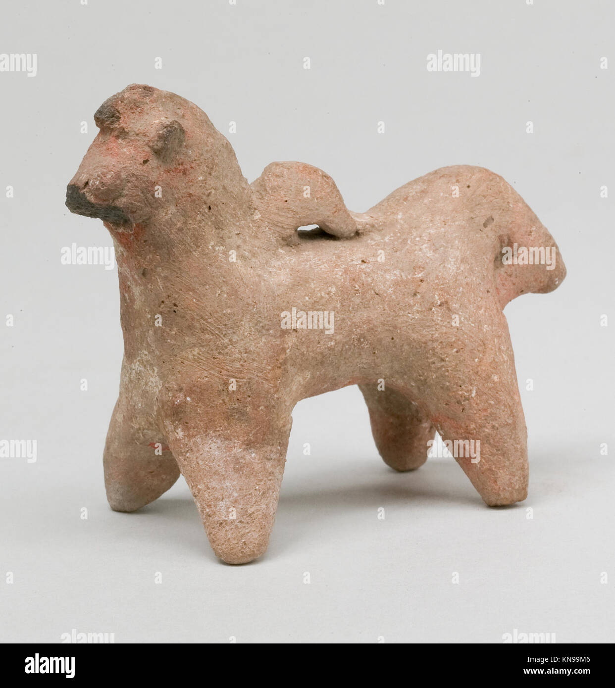 This figurine of a donkey is a detailed representation of the animal ...
