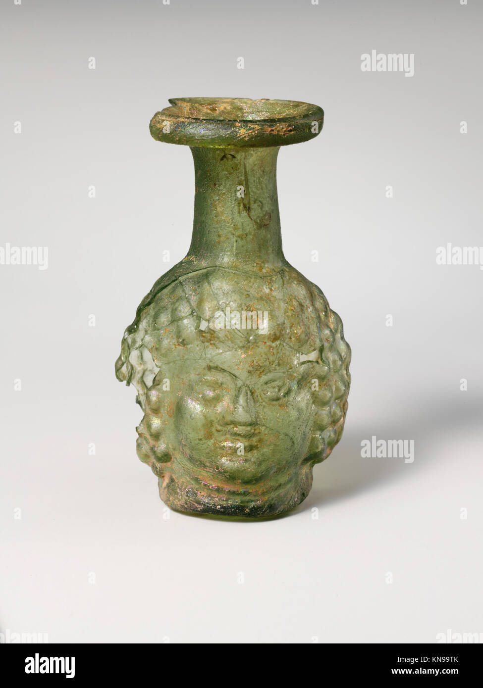 This glass double head flask is an ancient container with dual spouts ...