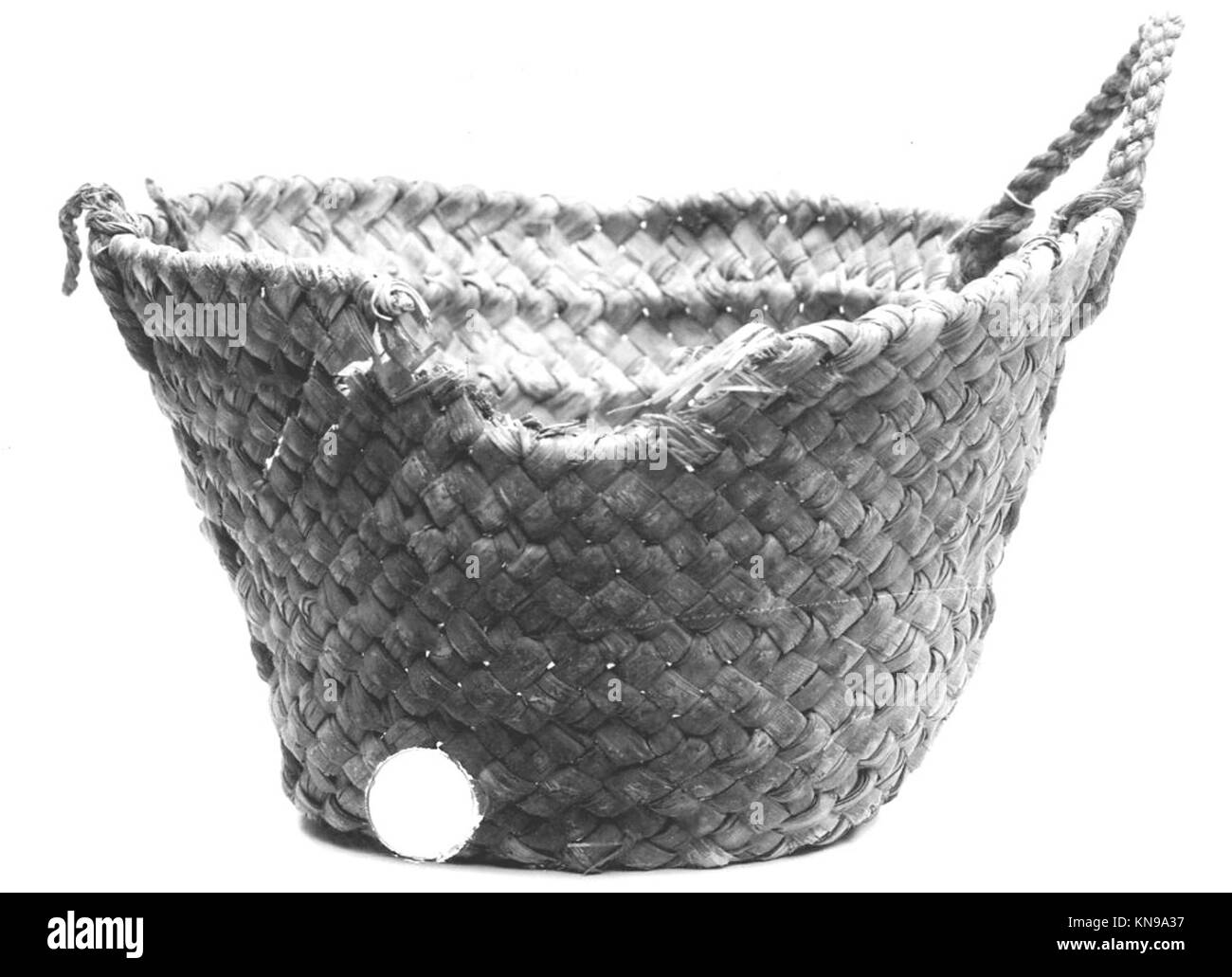 This basket features two handles and showcases the utility and ...
