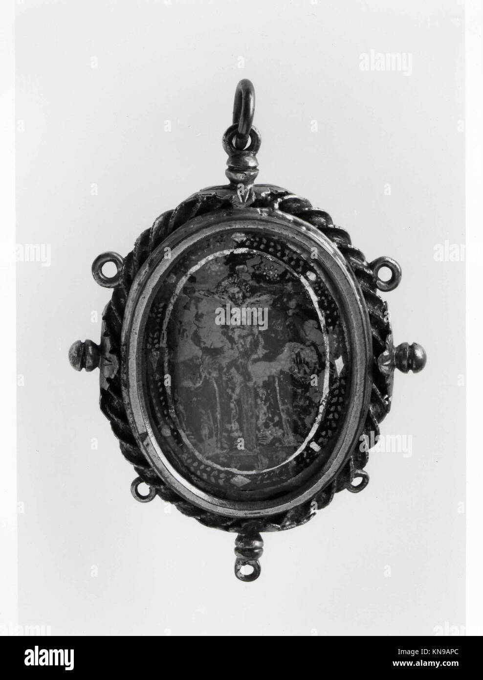This devotional pendant serves both as a religious artifact and a piece ...