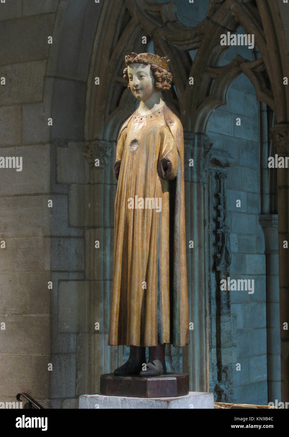 This figure represents a king, showcasing regal attire and posture. The ...