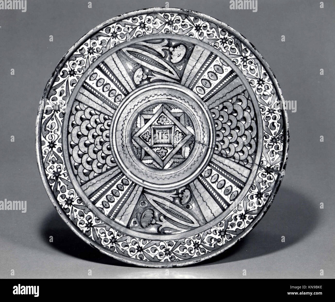 A dish designed for a ewer, typically used for holding liquids. This ...